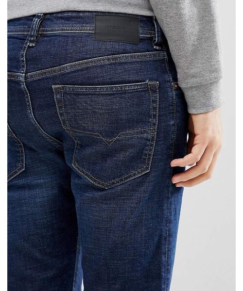 DIESEL（ディーゼル）の「Diesel Buster Slim Fit Jeans in Dark Wash（デニムパンツ）」 - WEAR